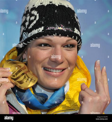 Maria Riesch Of Germany Celebrates Winning The Gold Medal During The Medal Ceremony For The