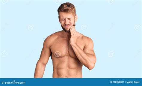 Young Caucasian Man Standing Shirtless Touching Mouth With Hand With