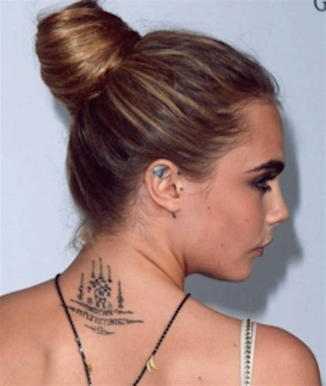 A Guide To Cara Delevingnes Tattoos And Their Meanings