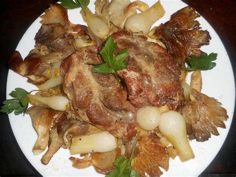 Recette de Pavé de porc aux oignons nouveaux et pleurotes
