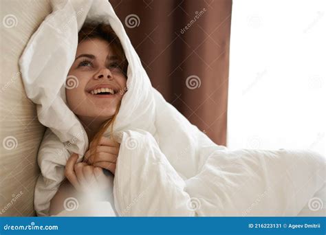 Cute Woman Tied Up Under Blanket In Bed In The Morning Near Window Cropped View Stock Image