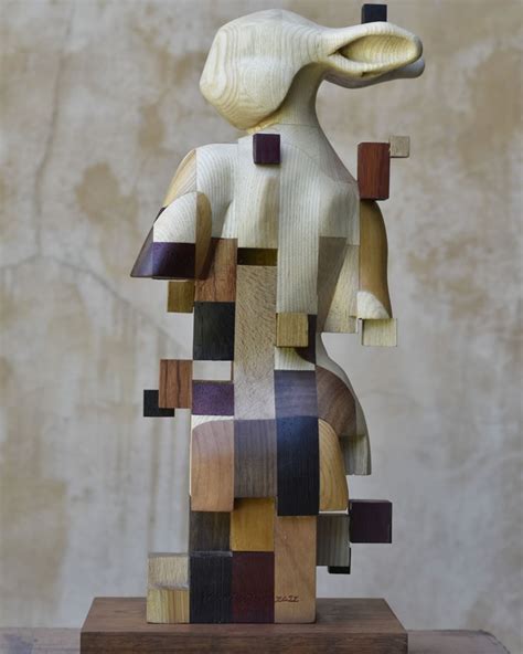 Artist Han Hsu Tung Crafts Intricate Pixelated Wood Sculptures
