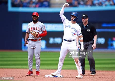 Whit Merrifield Of The Toronto Blue Jays Celebrates An Rbi Double In