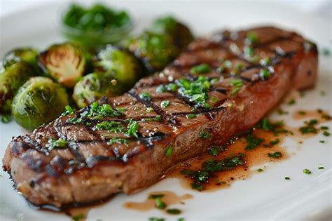 Grilled Steak With Brussel Sprouts Premium Ai Generated Image