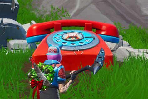 Fortnite Composer le numéro du Pizza Pit sur le téléphone géant à l