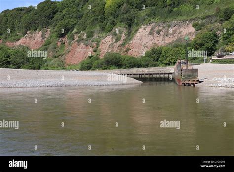 The Mouth Of The River Axe As It Meets The Sea At Axmouth In Devon It