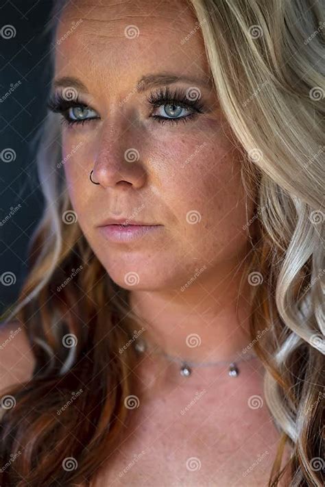 Gorgeous Blonde Model Poses Nude In A Home Environment Stock Image