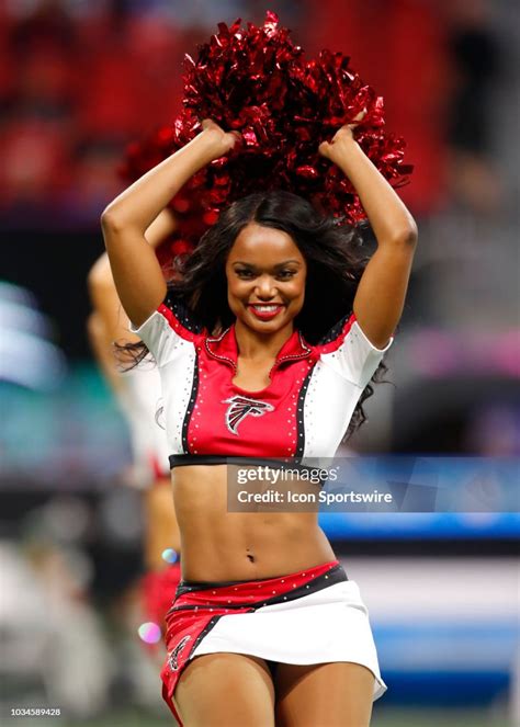 An Atlanta Falcons Cheerleader Performs Prior To An Nfl Football Game