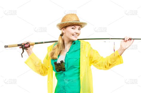 女人钓竿设备用品渔妇休闲活动水平画幅简易钓鱼运动雨衣波兰