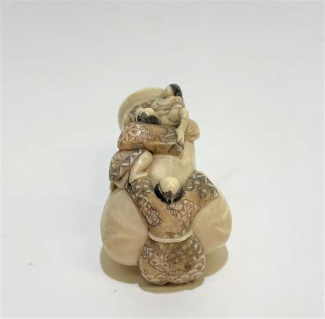 Japanese School 19th Century A Japanese Carved Erotic Okimono Of A