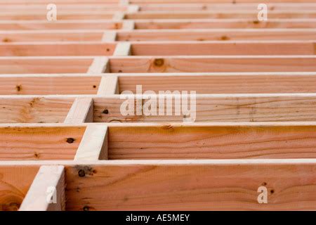Wood Blocking In A Staggered Pattern Between Floor Joists At A