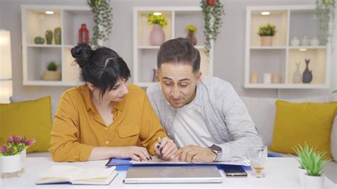 The Couple Looking At The File Nods And Is Happy 33031038 Stock Video