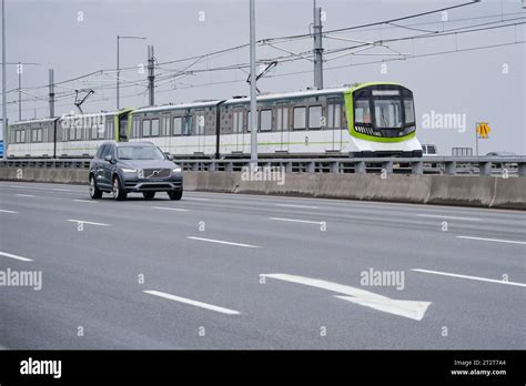 New Rem Light Rail Transit Train Going Along Champlain Bridge Stock