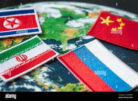 Symbols Of Russia China North Korea And Iran Against The Background