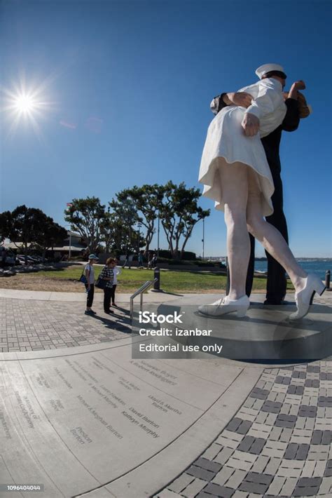 People Taking A Selfie At Sailor And Nurse While Kissing Statue San