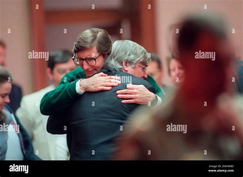 Fred Tokars Hugs His Attorney Ed Moriarity After He Was Sentenced To