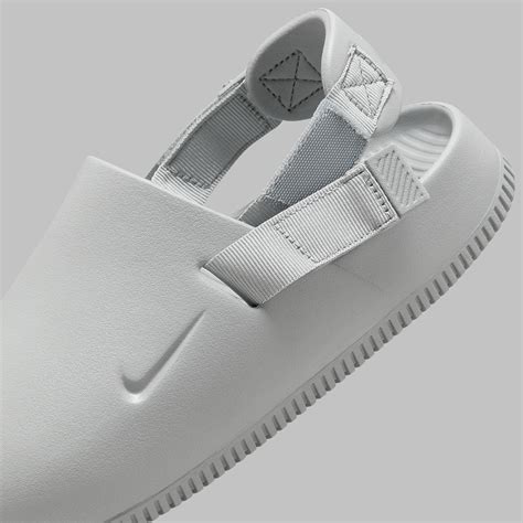 The Nike Calm Muleclog In Grey Is Featured In The Official Images