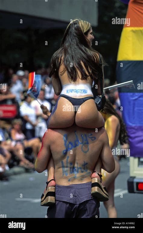 Naked Nude Woman Wearing In Demonstration Of Activism In Street During