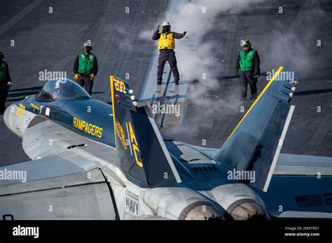 Usa 14th Dec 2022 Sailors Direct An F A 18e Super Hornet Fighter Jet Attached To The