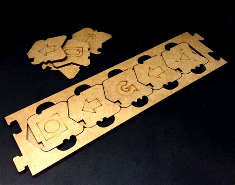 Pieces Representing Commands And Inserted Into The Guide Base In MDF