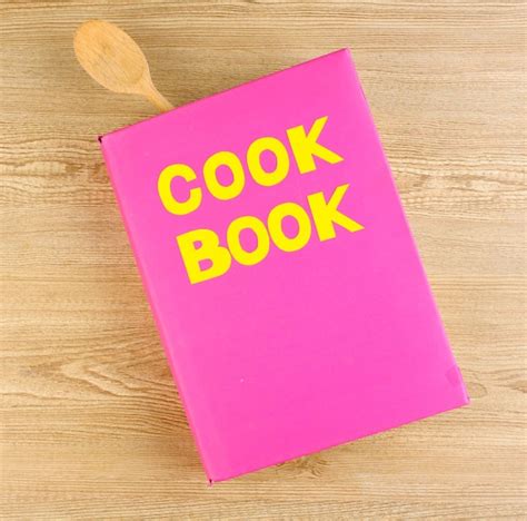 Premium Photo Cookbook And Kitchenware On Wooden Background