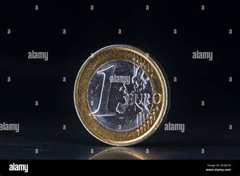 Old One Euro Coin Stands On Dark Metallic Background Stock Photo Alamy