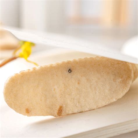 香脆微甜烘烤黑芝麻年糕片干胖零食糕点散称杭州特产即食农家手工 虎窝淘
