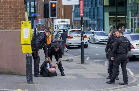 Moment Wanted Man Who Pointed Gun At Cops Is Arrested In Front Of