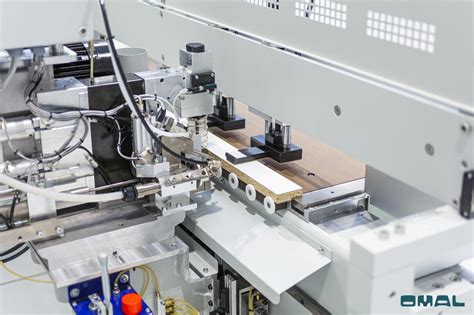 HORIZONTAL BORE GLUE DOWEL AND HARDWARE INSERTION MACHINES