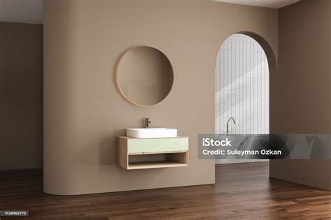 태양 광선 캐비닛 타원형 거울 싱크대 흰색 욕조 쪽모이 세공 마루 바닥 타일이있는 베이지 색 미니멀리스트 욕실 인테리어 최소한의 디자인의 개념 3d 렌더링 욕실에 대한 스톡