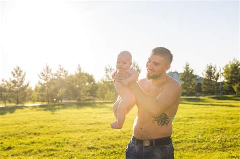 Premium Photo Full Length Of Shirtless Man Standing On Field