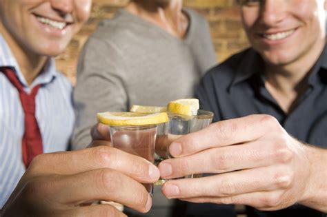 Three Men Drinking Shots Free Stock Photo FreeImages