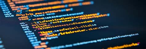 blue website code on a black screen programming and technology depth of