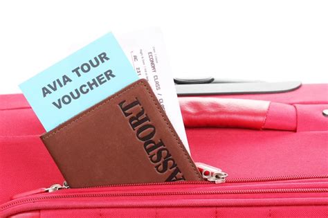 Premium Photo Passport And Ticket On Suitecase Closeup