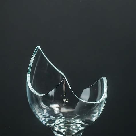 Broken Glass On Black Background Premium Ai Generated Image
