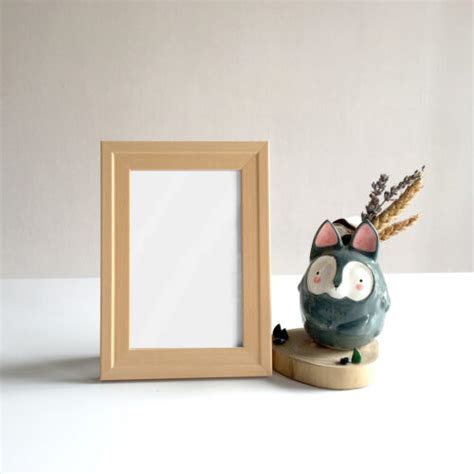 Free Small Frame With Figure Mockup Mockupbee