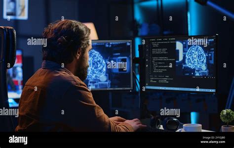 Developer Updating Artificial Intelligence Neural Networks Typing On