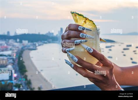 One Pina Colada Cocktail at a Rooftop Bar in Thailand Stock Photo - Alamy