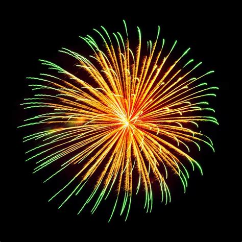 Single Exploding Golden Color Firework Isolated On Black Background