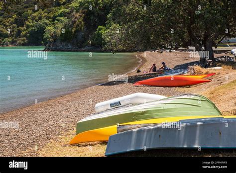 Boats And Sunbathers On The Beach At Russell Bay Of Islands North