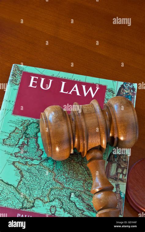 Brexit Concept Image Of Eu Law Book With Map Of Uk And Europe Front Cover On Desk With Judges
