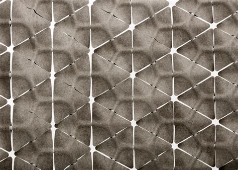 Layer Uses Large Hemp Tiles To Create Scale Partition System