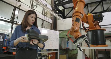 Young Asian Female Industrial Robotics Engineer Stock Footage Video