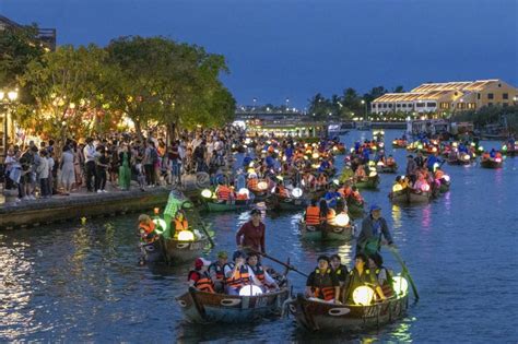 Tourists Enjoy The Boat Ride On The Bon River In Hoi An Vietnam