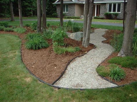 Walkways And Pathways Of Pea Stone Pebbles Crushed Gravel And Other