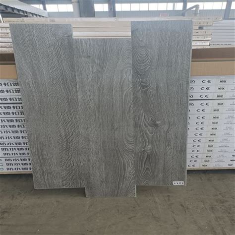 China Waterproof Wood Grain Interlocking SPC Flooring Manufacturers Suppliers Low Price