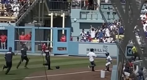 Video Fan Who Ran Onto Dodger Stadium Field Eludes Security But Not