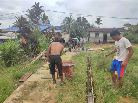 Satgas Yonarmed 19 105 Trk Bogani Bantu Warga Bangun Pondasi Gereja