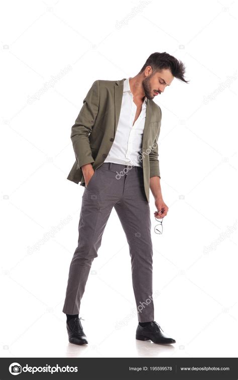 Man Standing Sideways Looking Down