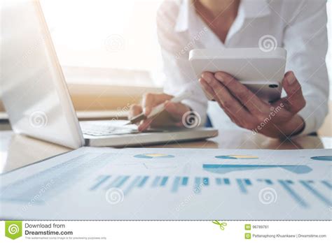 Female Accountant Calculations And Analyzing Financial Graph Dat Stock Image Image Of